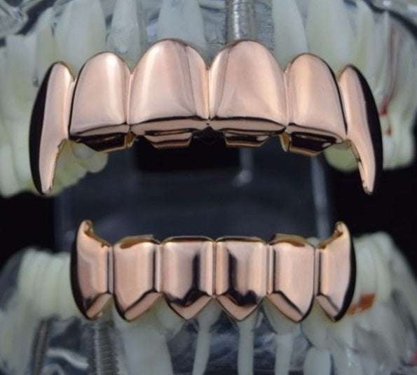 Rose Gold Fang Grillz Set – Rhino Grillz
